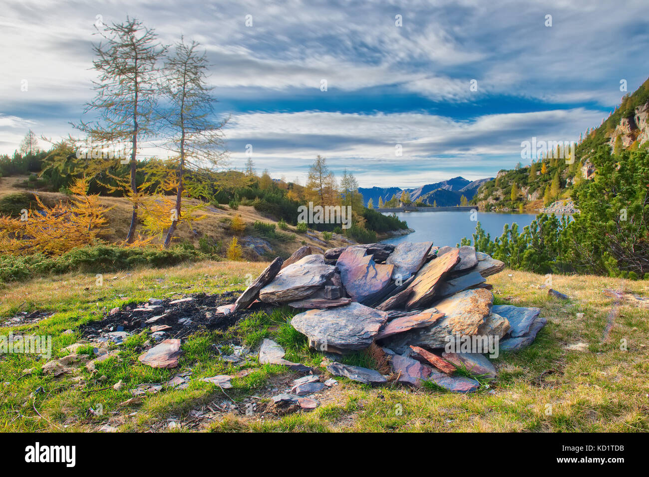 Preparation with barbecue bonfire stones for summer camp boy scout in ...