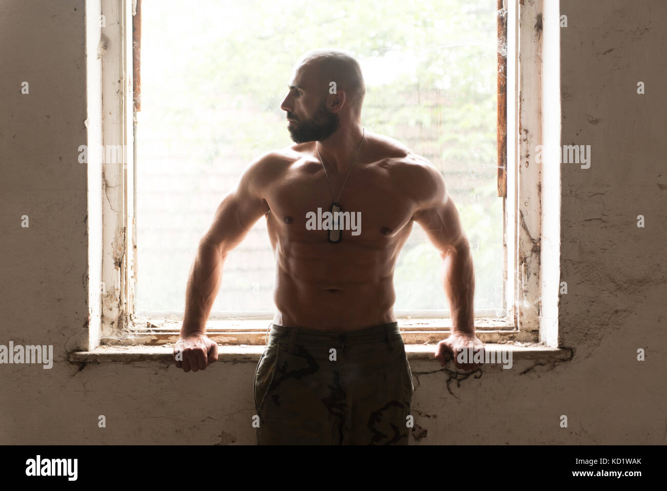 Portrait of a Physically Fit Man Showing His Well Trained Body ...