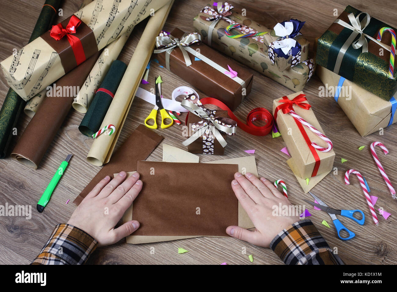 hand gift wrapping paper for the holiday Christmas Stock Photo - Alamy
