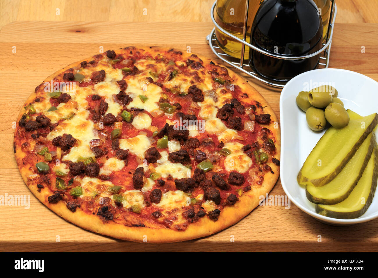 Pizza with sides Stock Photo - Alamy