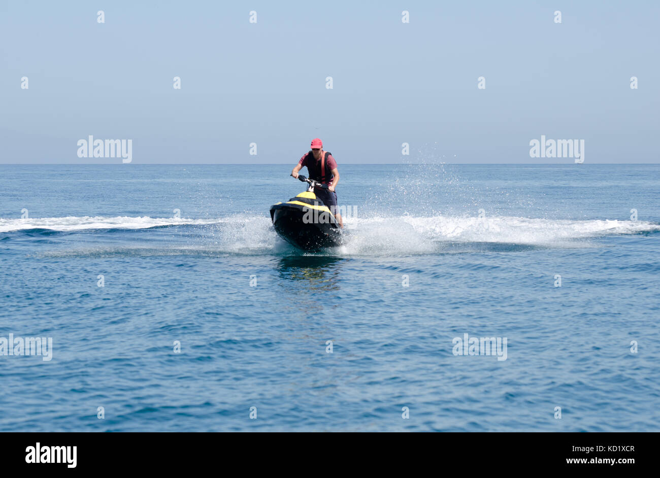 Man playing on a jet ski Stock Photo - Alamy