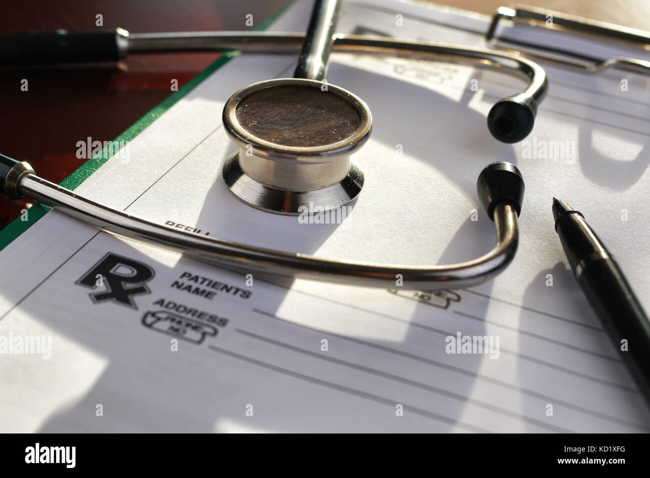 stethoscope medical documents pen Stock Photo - Alamy