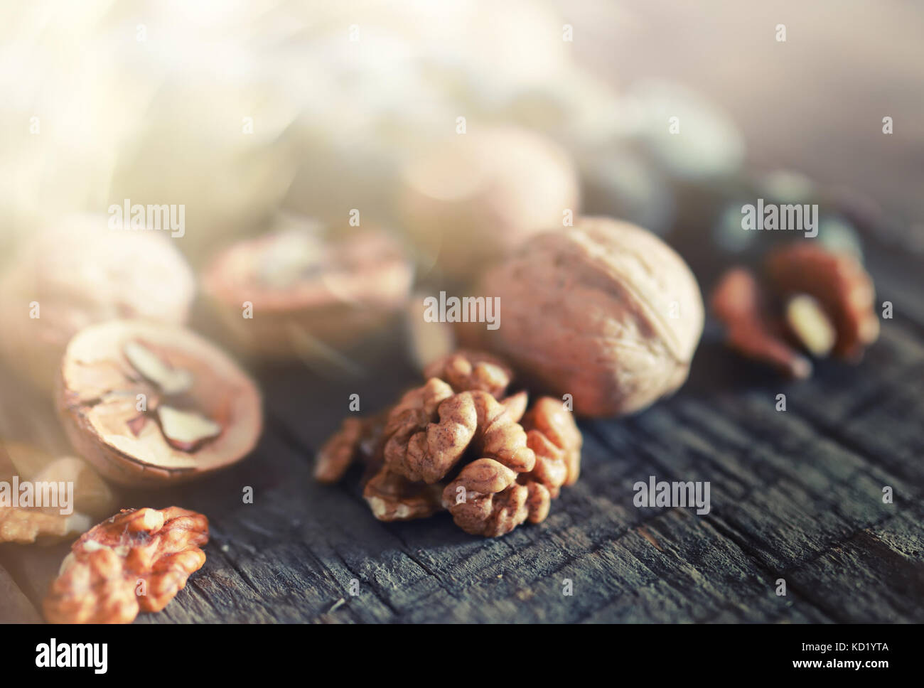 walnuts, whole and peeled wooden background Stock Photo - Alamy