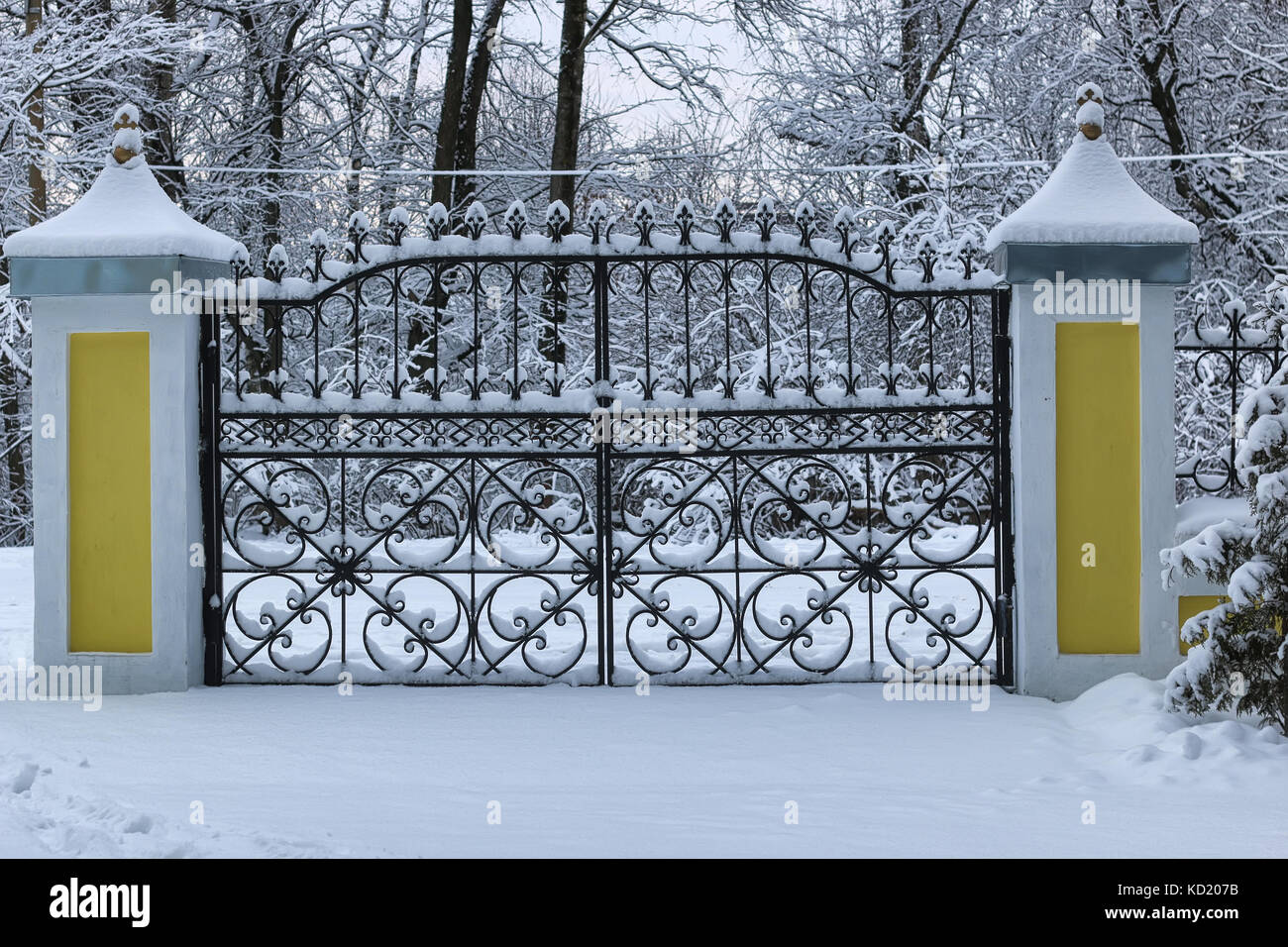 winter wrought fence gates Stock Photo - Alamy