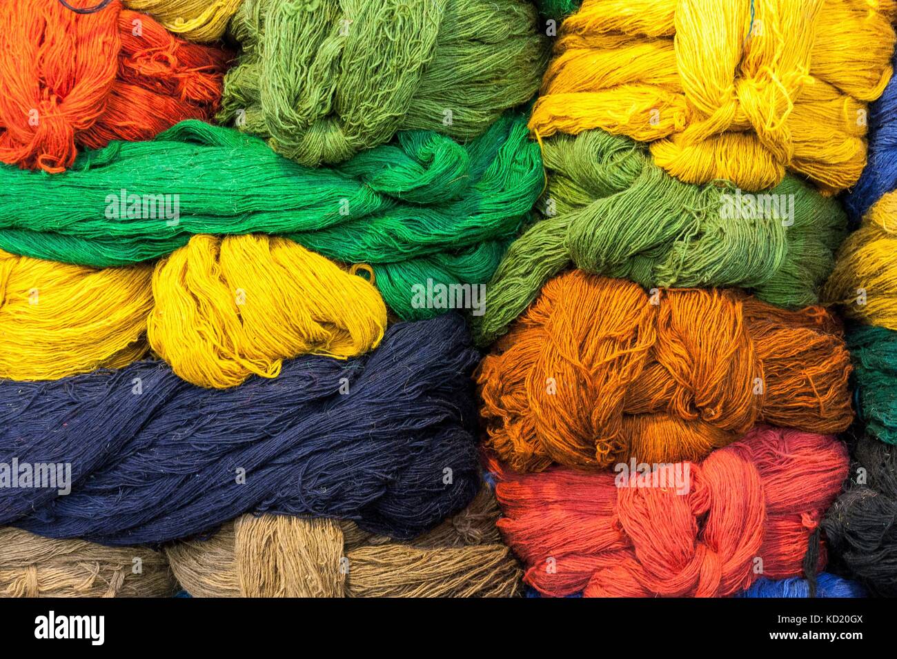 Colorful stacks of wool for fabrics and cloths in Iran Stock Photo - Alamy