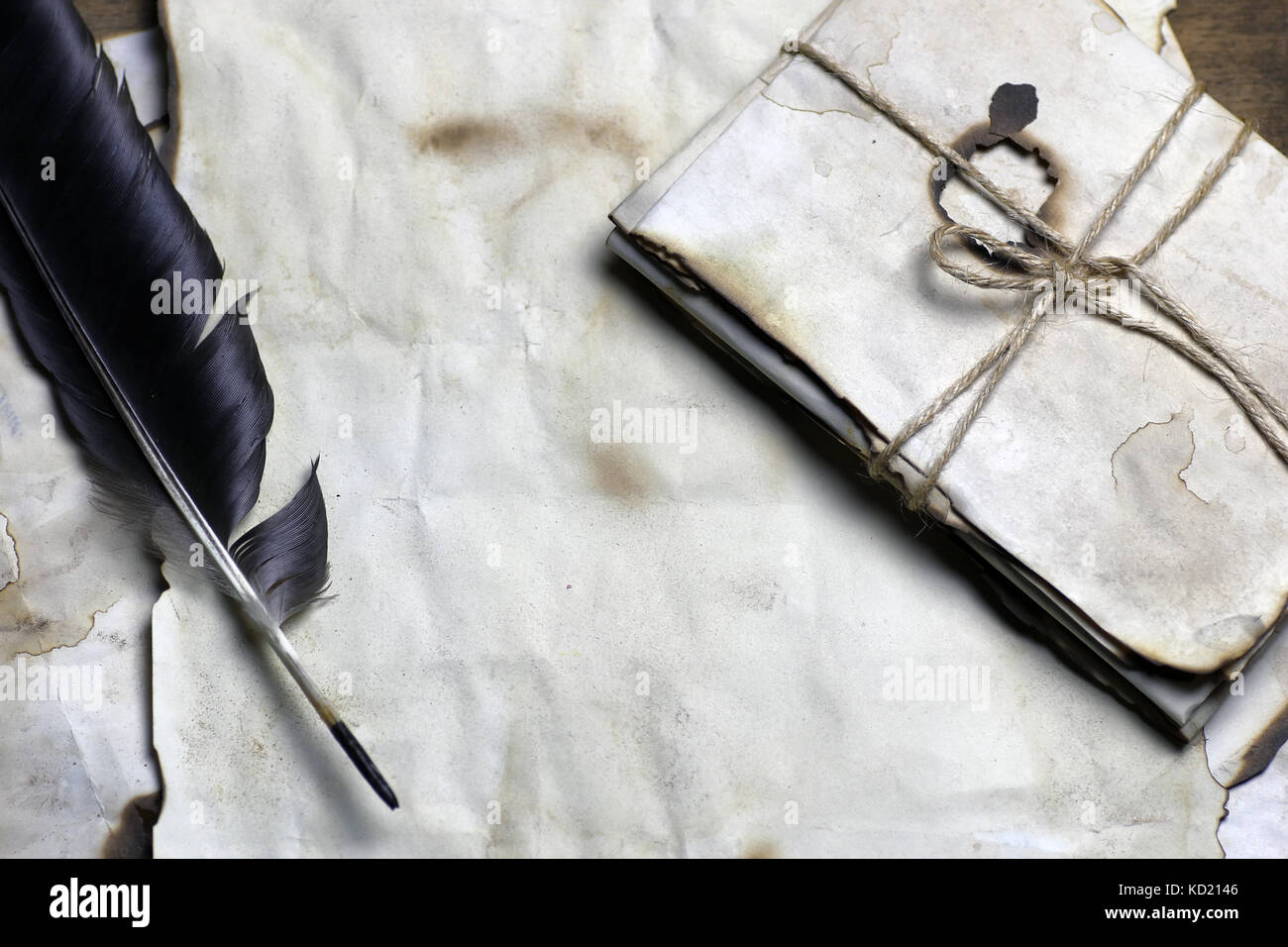 old paper letter feather Stock Photo - Alamy