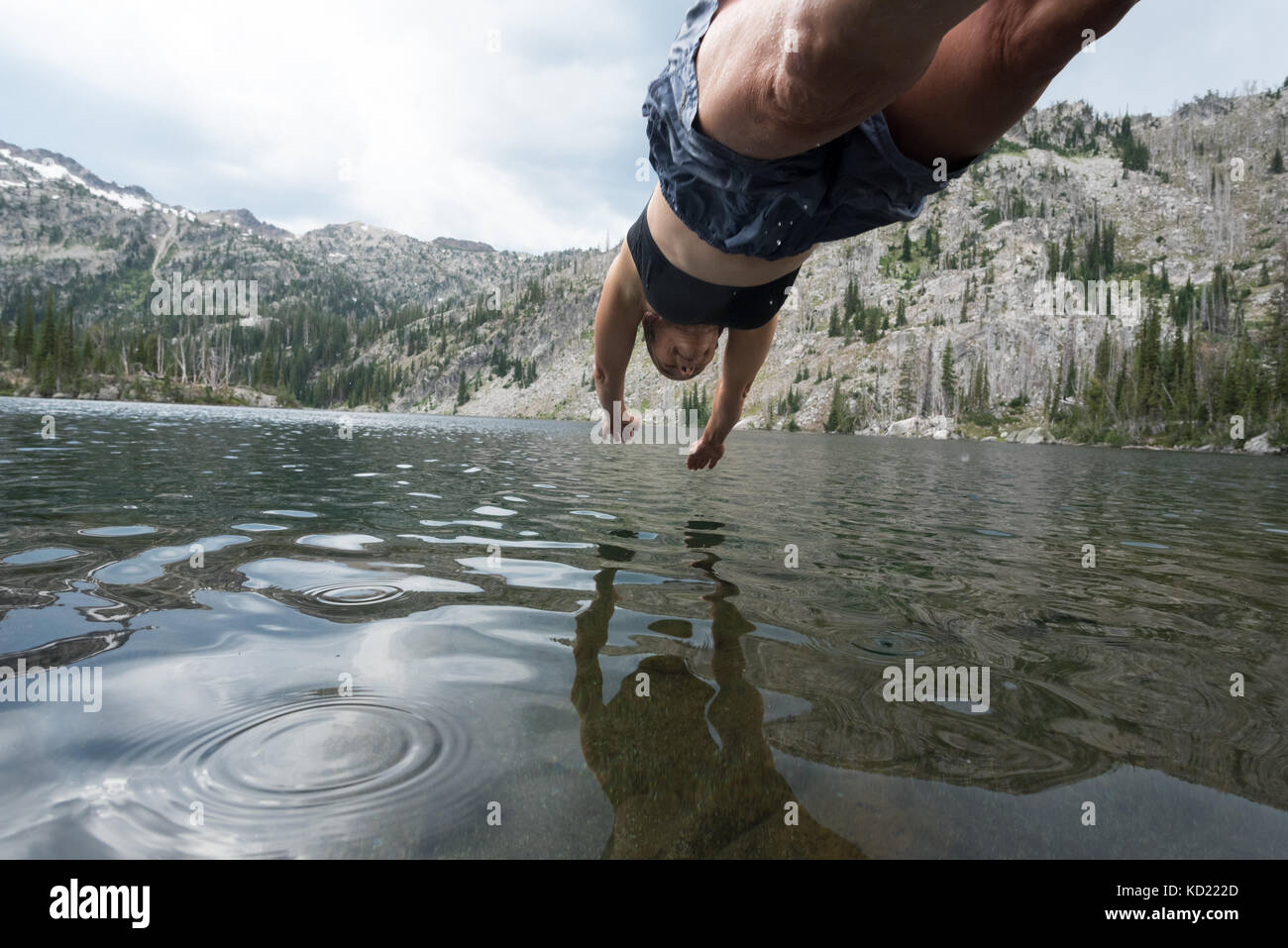Woman diving into a lake in Oregon's Wallowa Mountains Stock Photo - Alamy