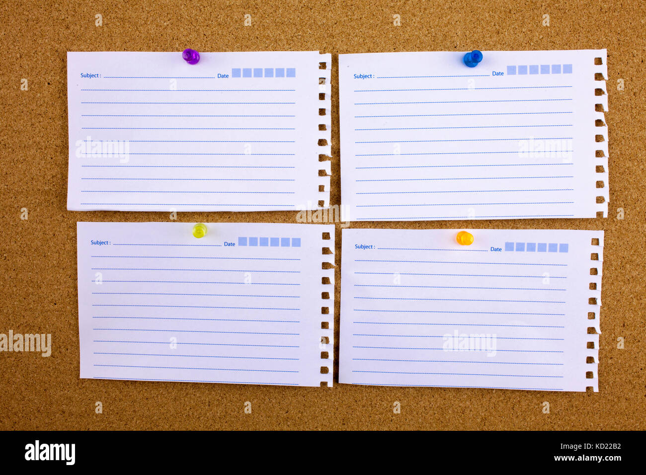 Lined note paper with sticky tape. Paper piece on white notice board ...