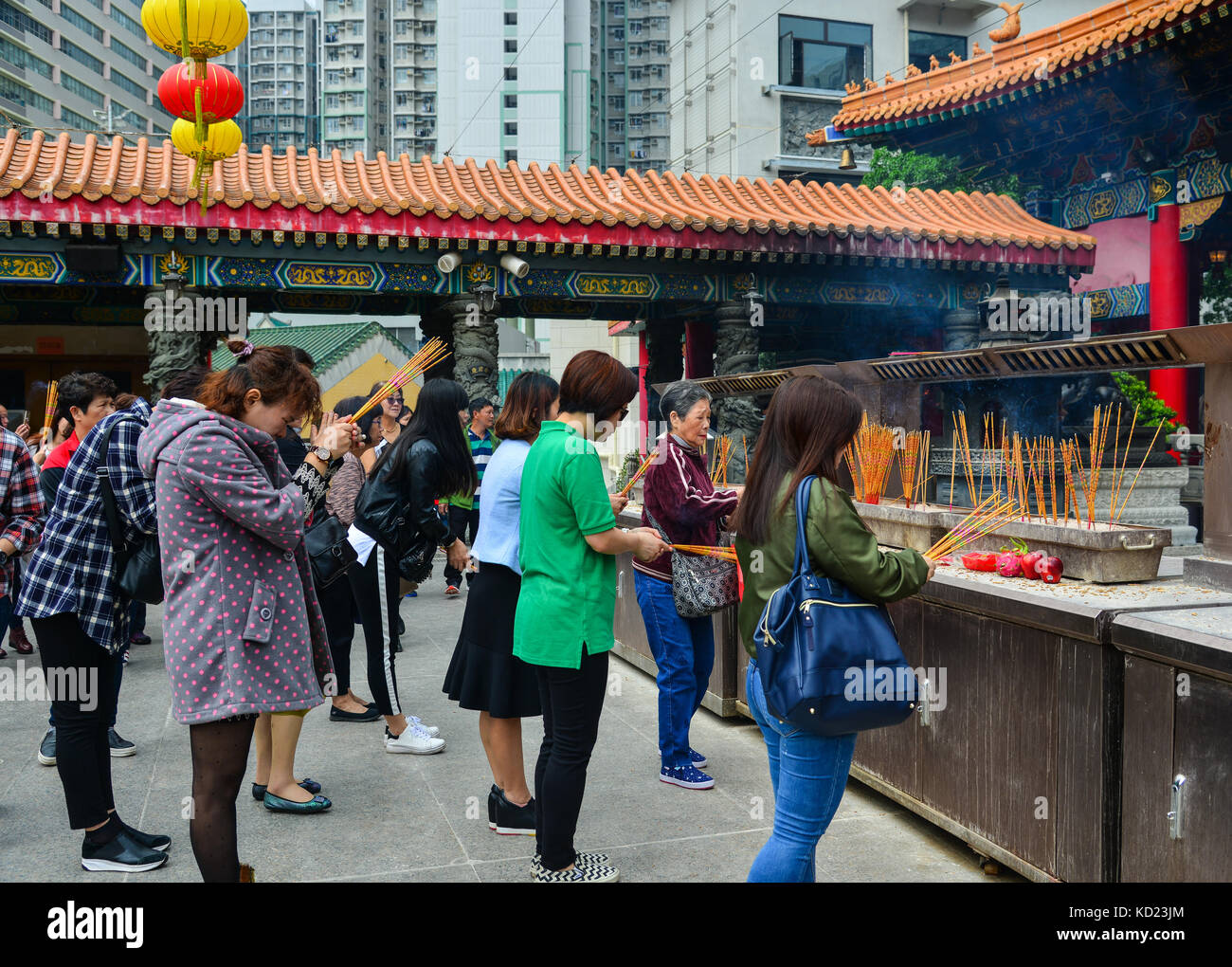 Hong Kong - Mar 30, 2017. People praying at Wong Tai Sin Temple in Hong ...