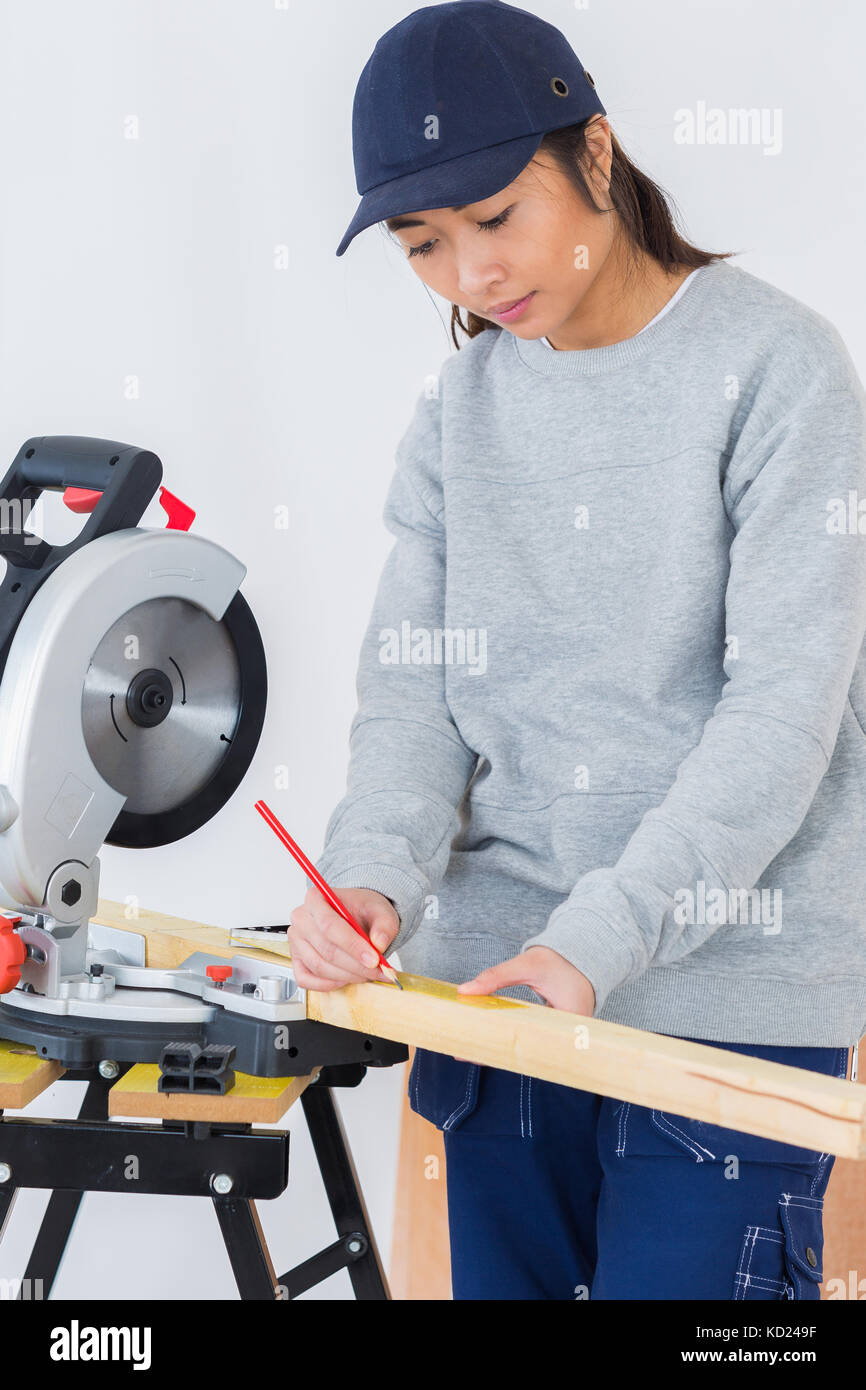 Asian female carpenter at work Stock Photo - Alamy