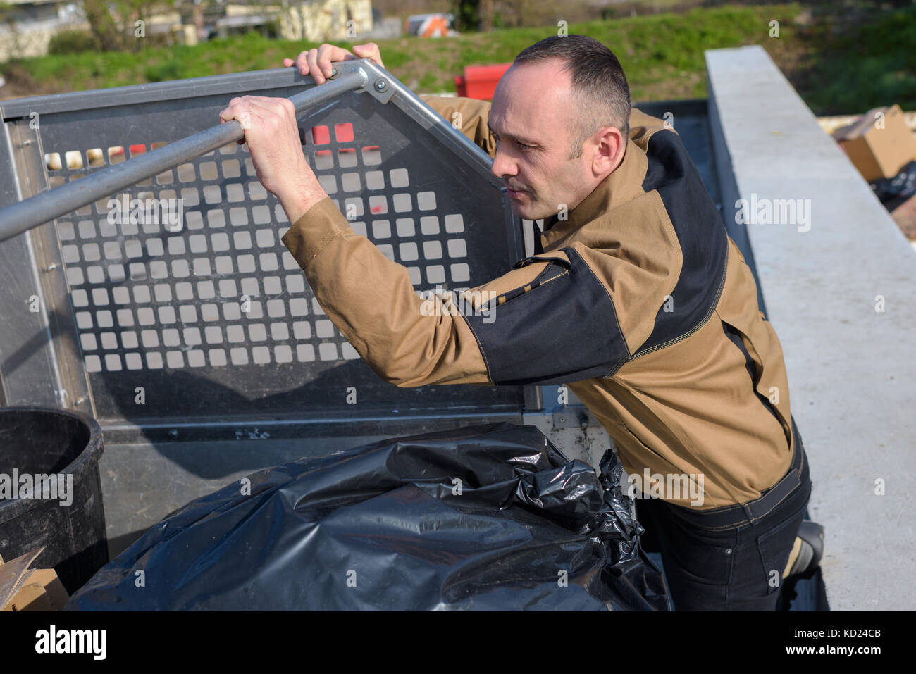 happy garbage collector on duty Stock Photo - Alamy