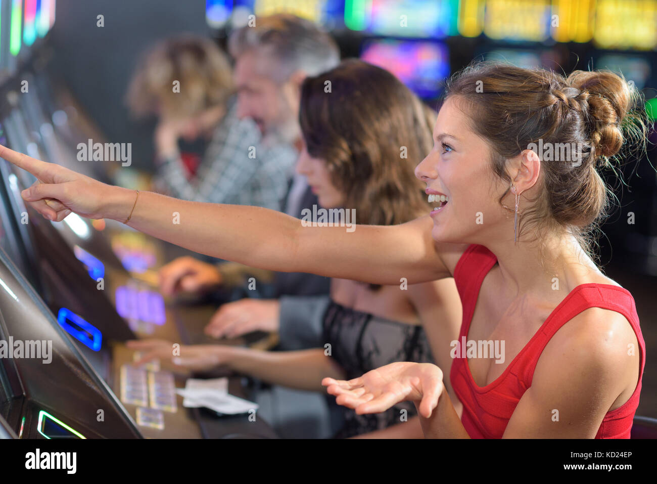 Sitting at gambling machine hi-res stock photography and images - Alamy