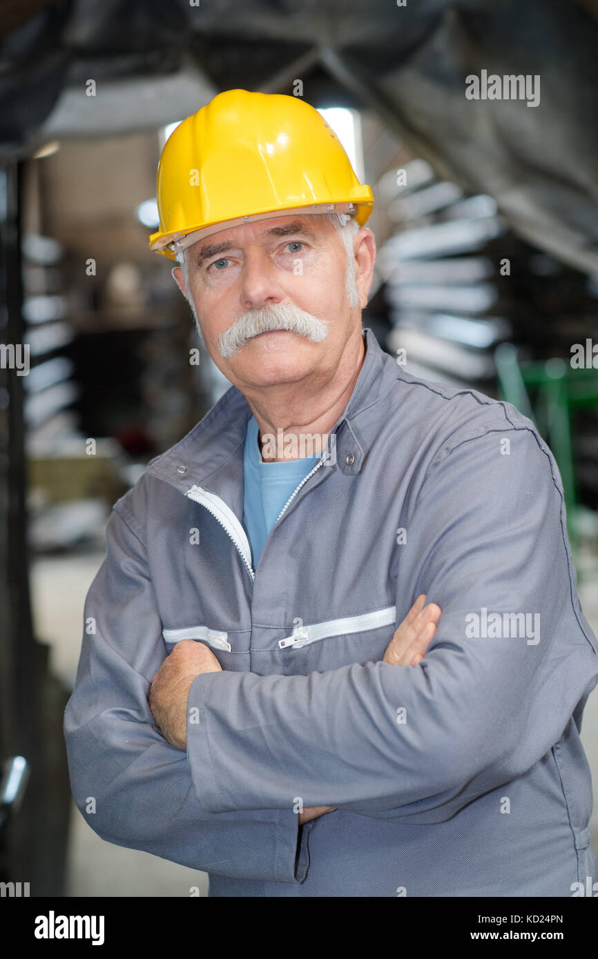an industrial worker posing Stock Photo - Alamy