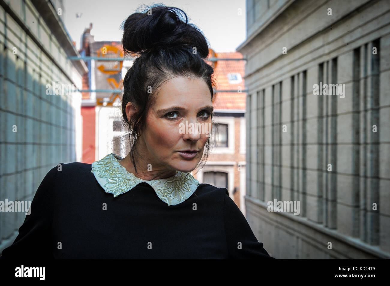 Model Monique Dolk posing for a portrait in a street fashion shoot ...
