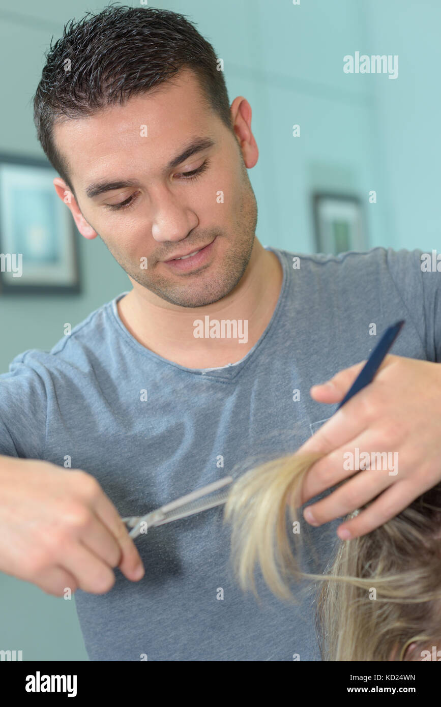 scissors cut the girls hair Stock Photo - Alamy