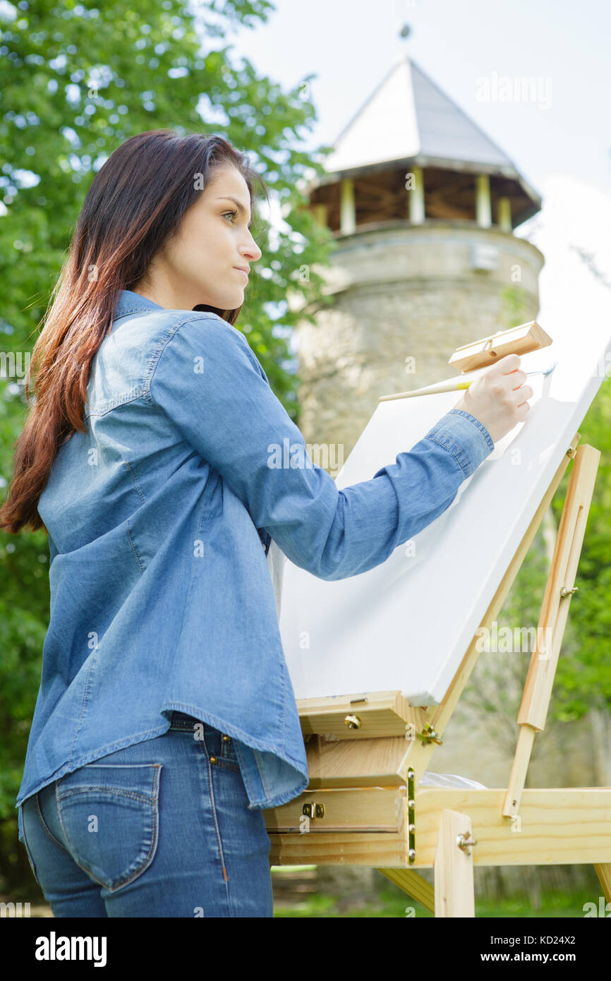 Woman doing architectural painting Stock Photo - Alamy