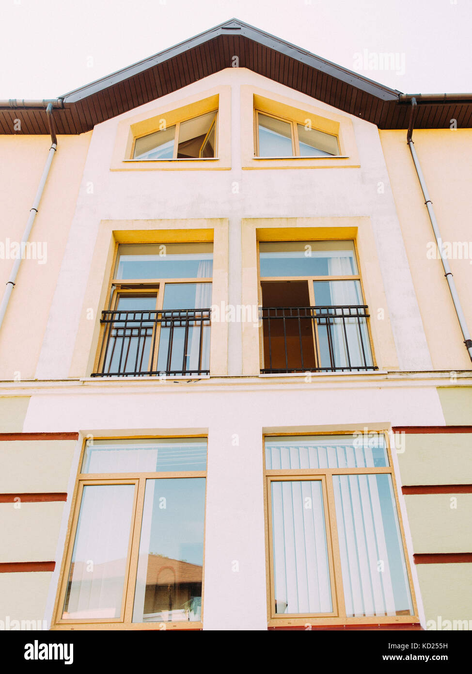 The upside view of the yellow house with open window Stock Photo - Alamy