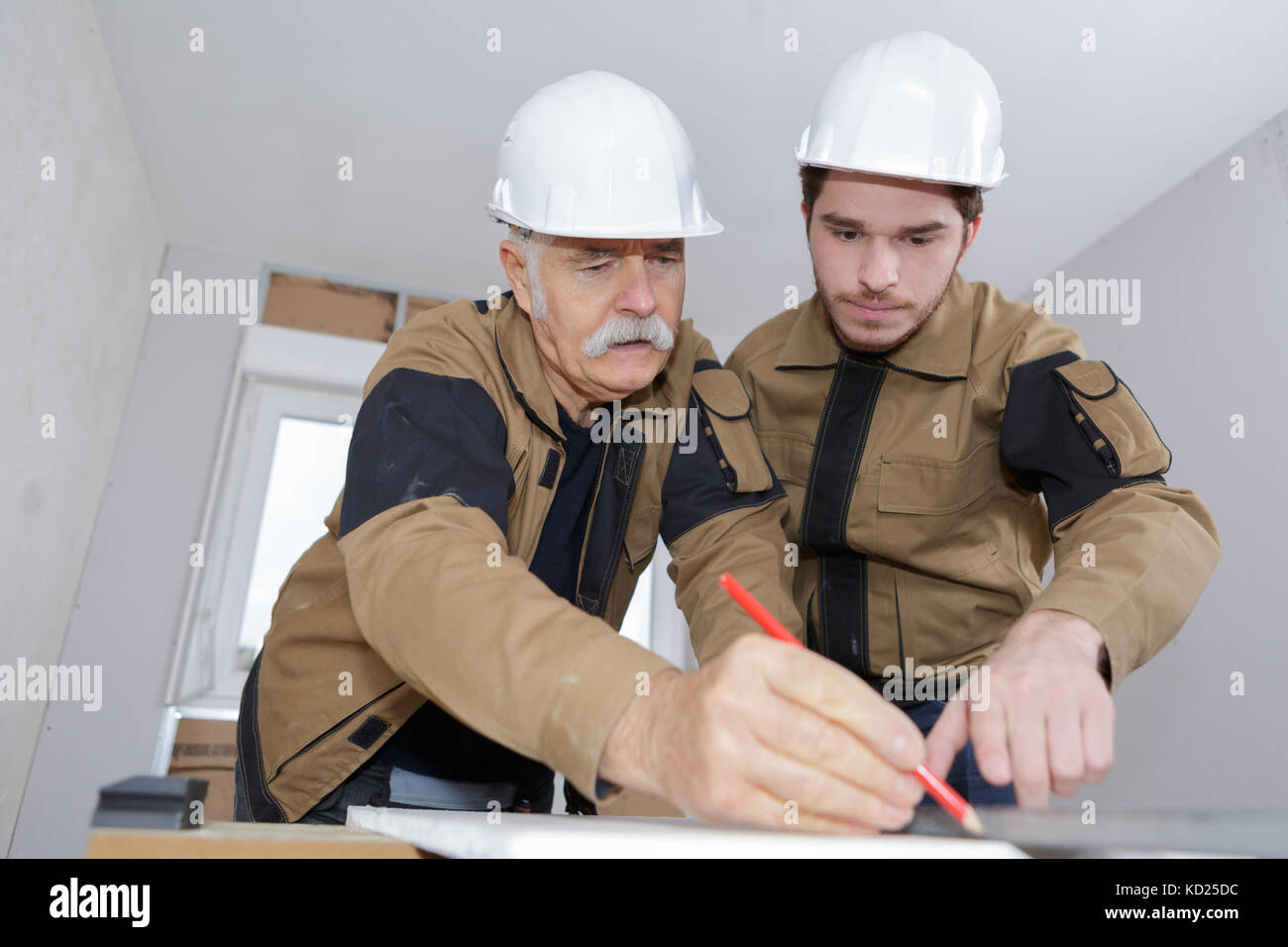 the carpenter apprentice and his teacher Stock Photo - Alamy
