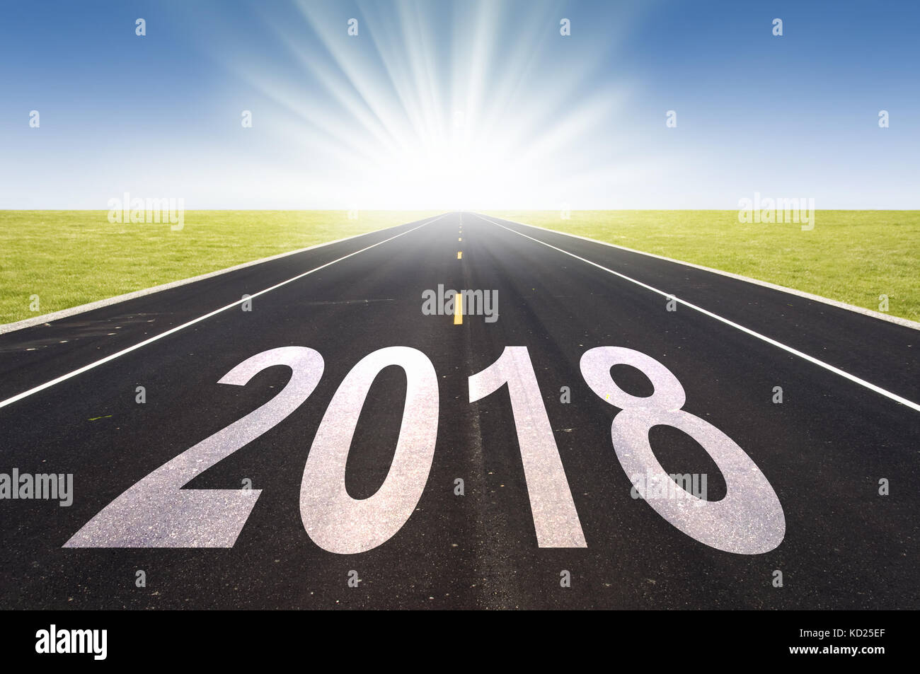 2018 road perspective with rising sun Stock Photo - Alamy