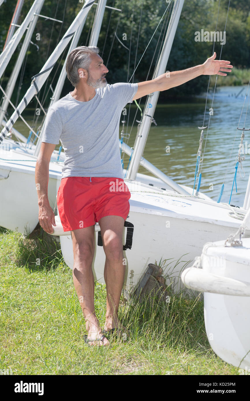 mature sailing professor giving lesson Stock Photo - Alamy