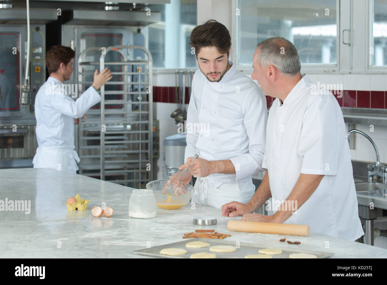 Pastry chefs at work Stock Photo - Alamy