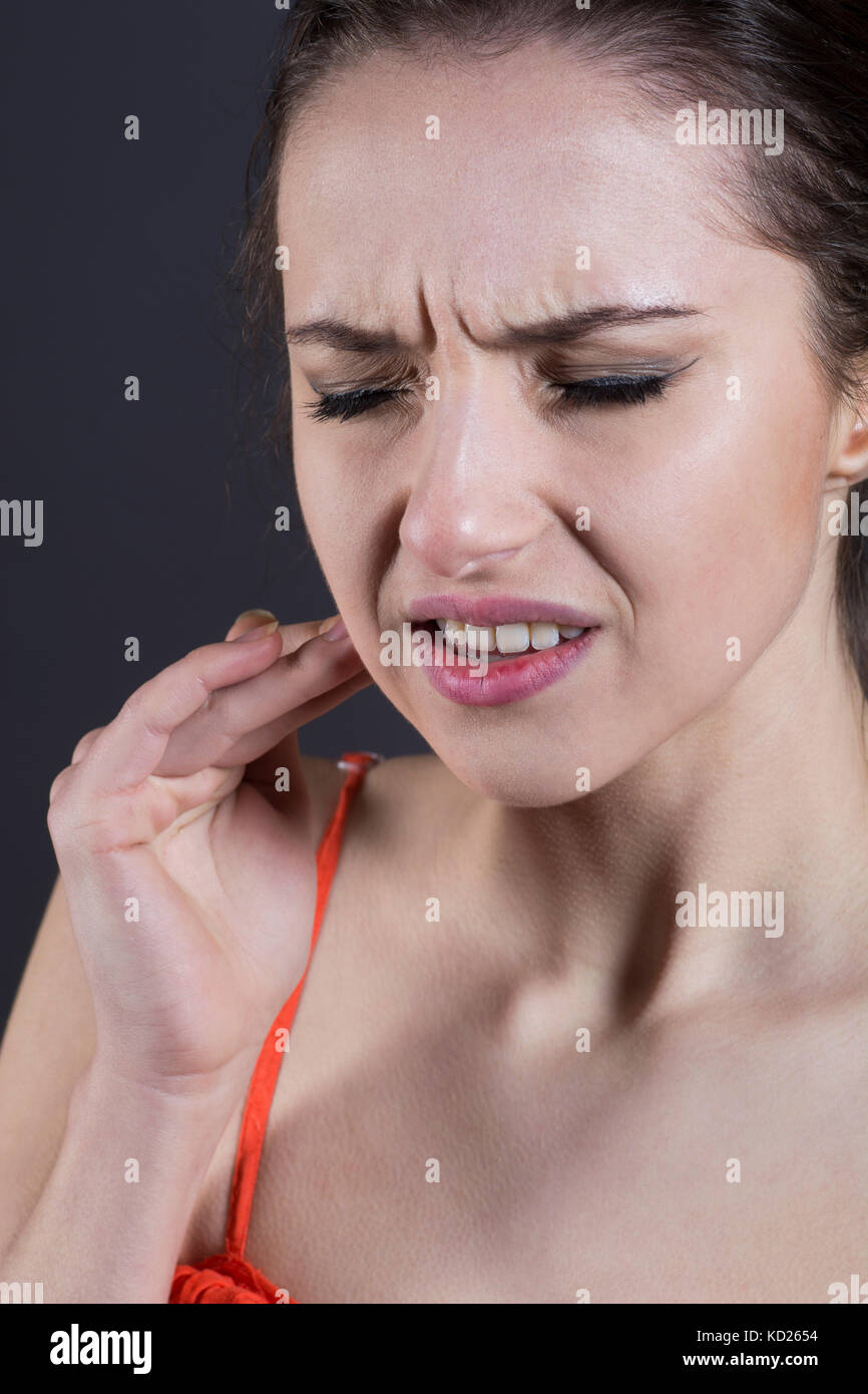 Close up portrait of a young woman with bad toothache Stock Photo - Alamy