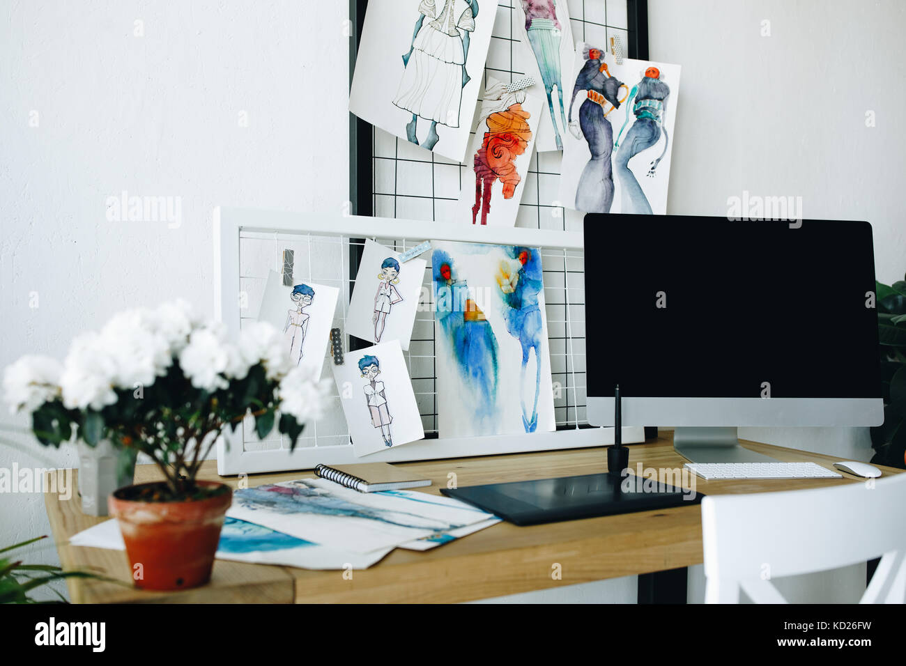 fashion designer workplace Stock Photo - Alamy