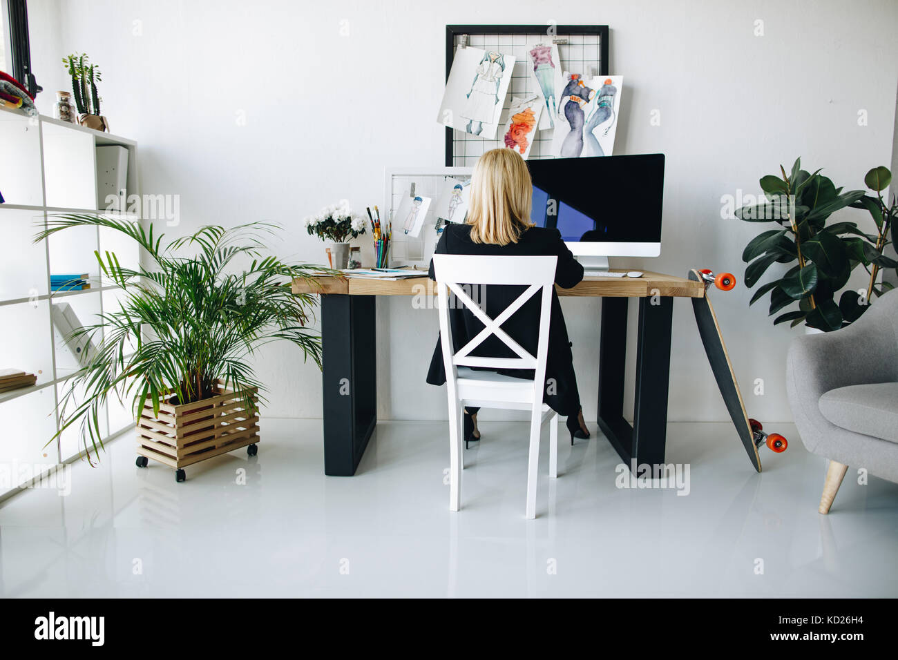 fashion designer at workplace Stock Photo - Alamy