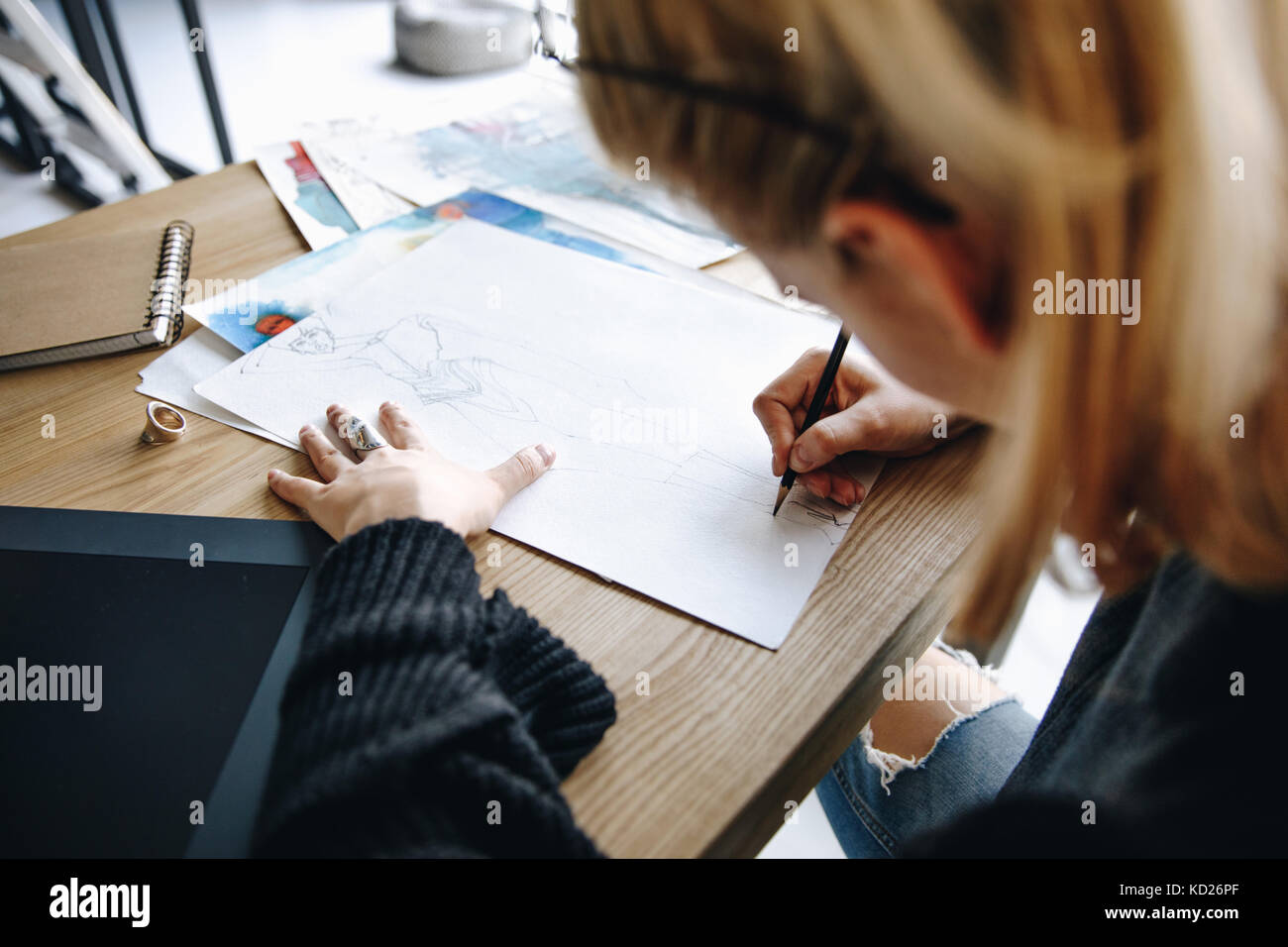 fashion designer drawing sketch Stock Photo - Alamy