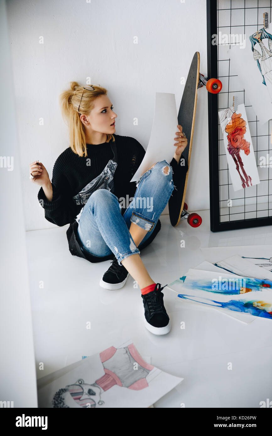 fashion designer drawing sketch Stock Photo - Alamy