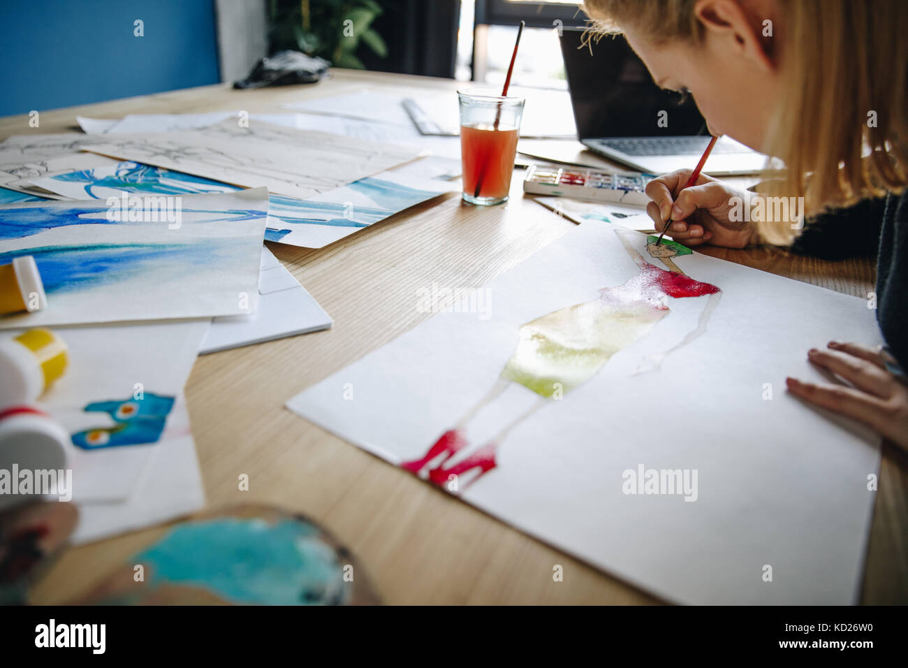 Fashion designer drawing sketch Stock Photo - Alamy