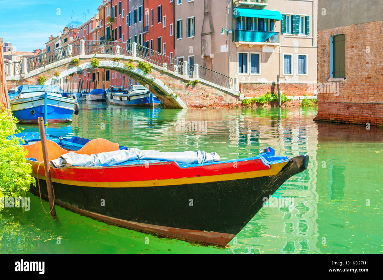 Boat floating on a canal, Venice Italy Stock Photo - Alamy