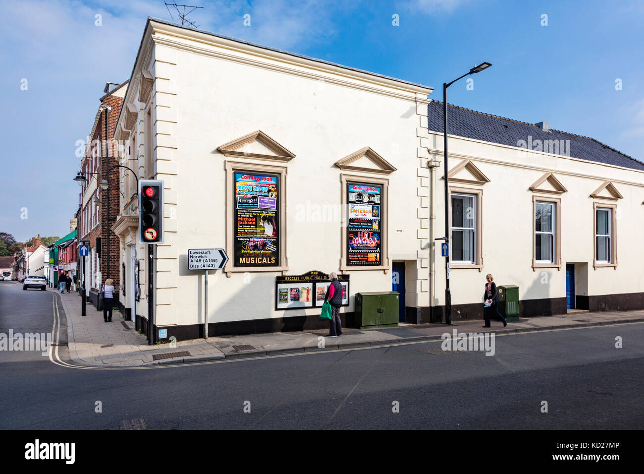 A woman looks at posters on the wall of Beccles Public Hall and Theatre ...
