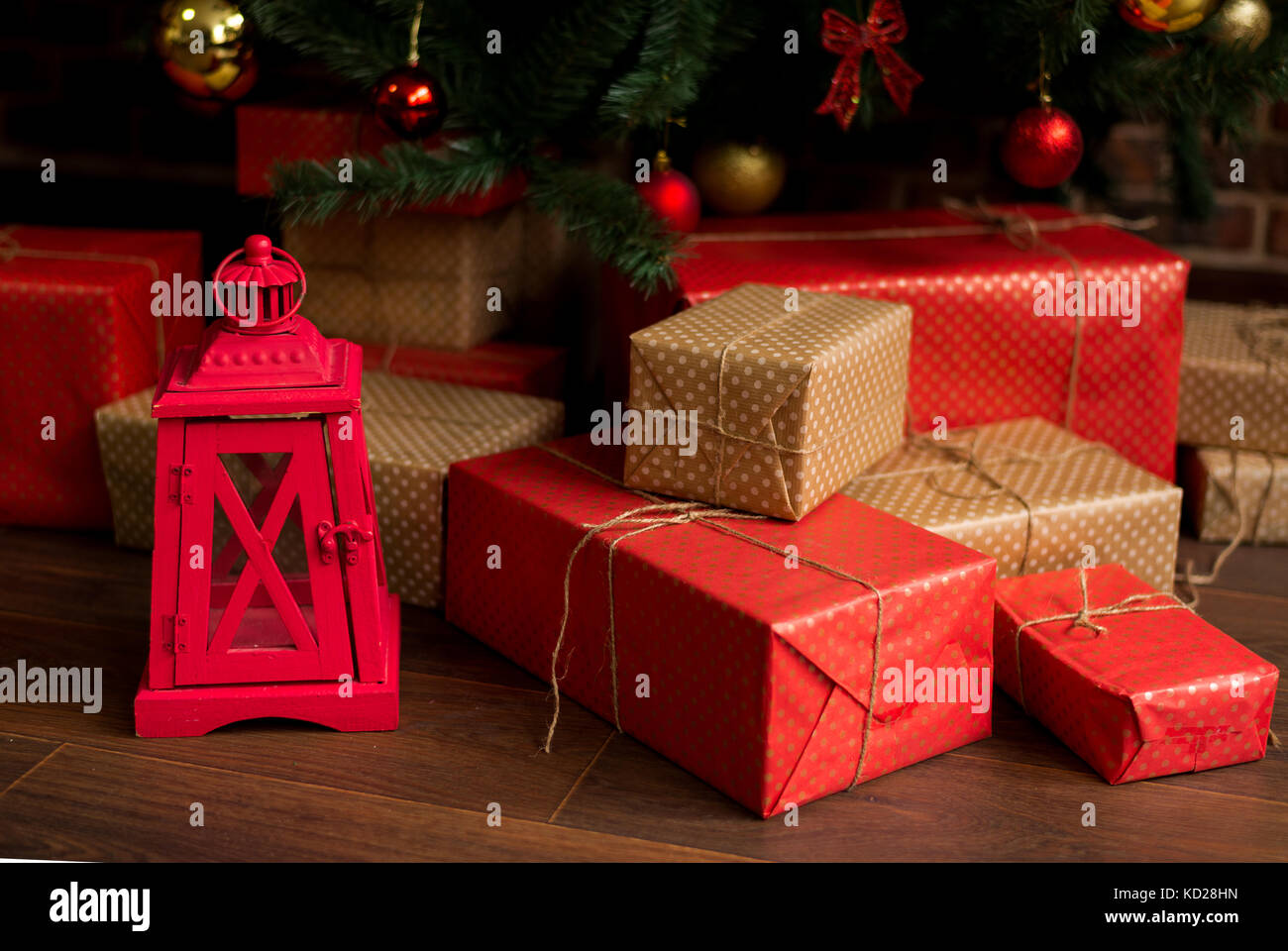 Boxes with Christmas gifts under the tree Stock Photo - Alamy