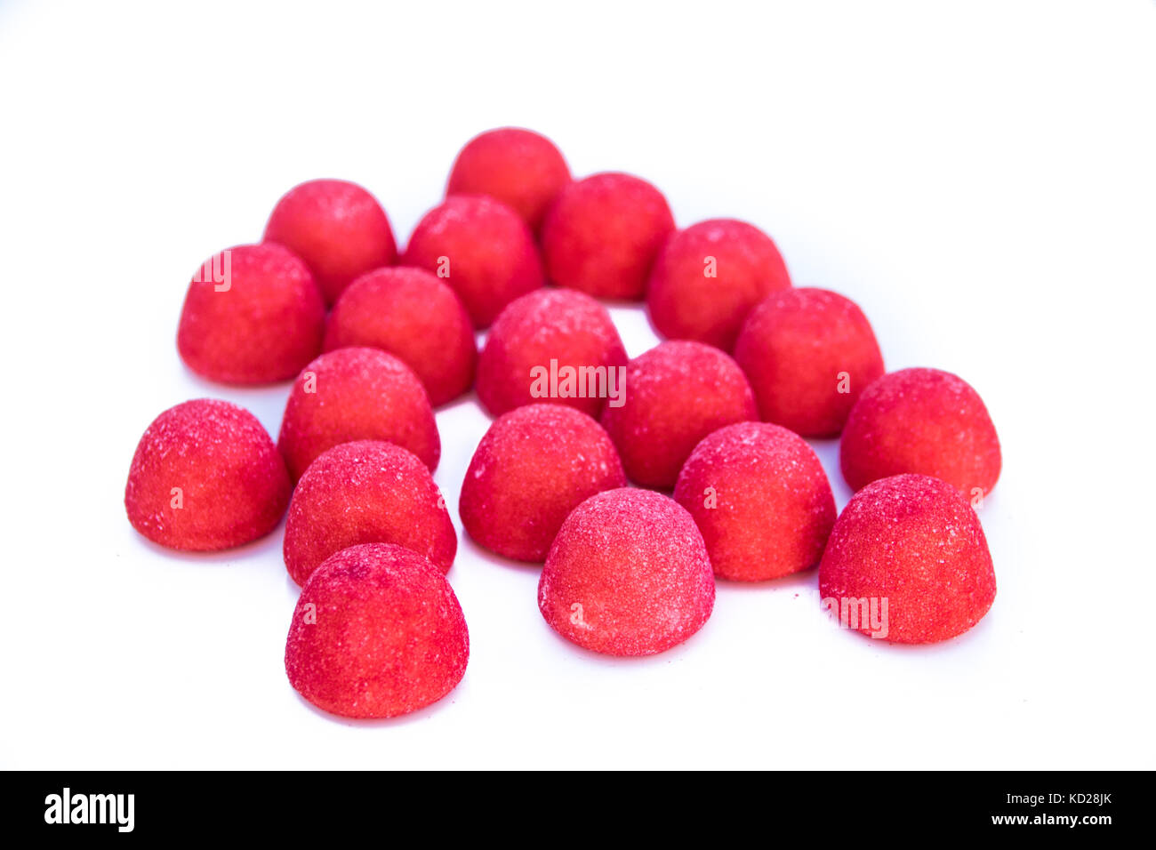 red candies isolated on white background Stock Photo - Alamy
