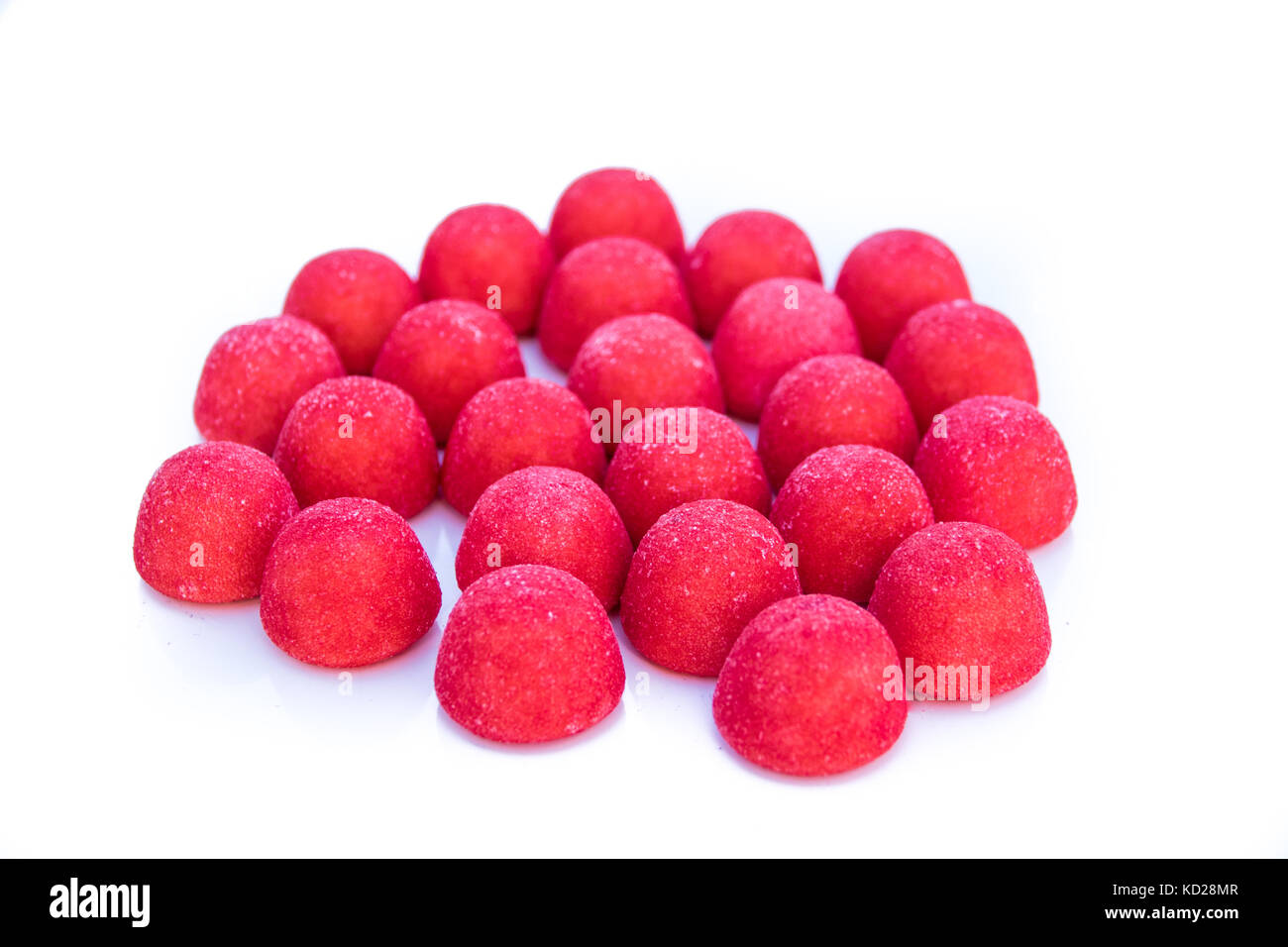 red candies isolated on white background Stock Photo - Alamy