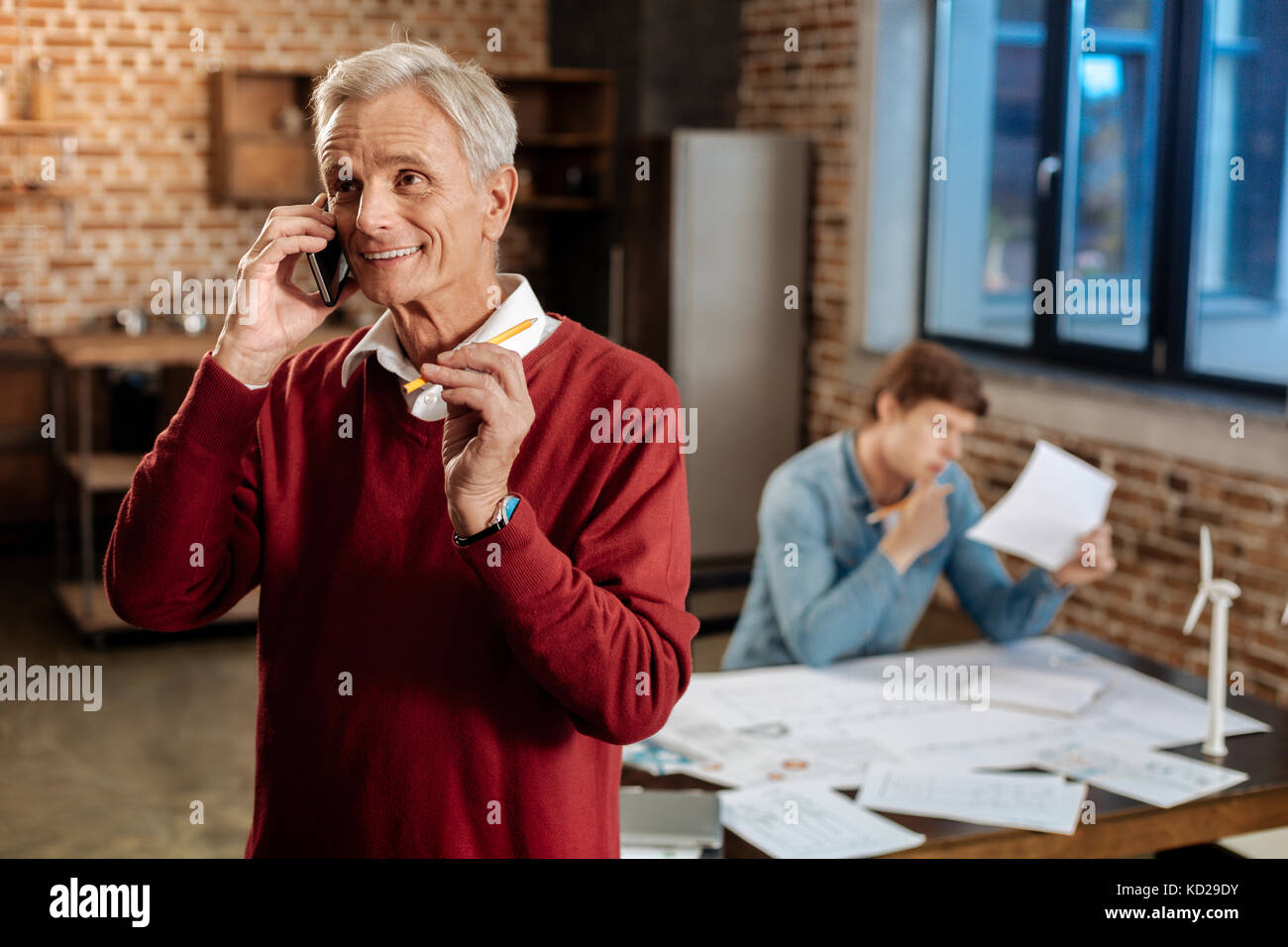 Joyful senior man talking on the phone Stock Photo - Alamy