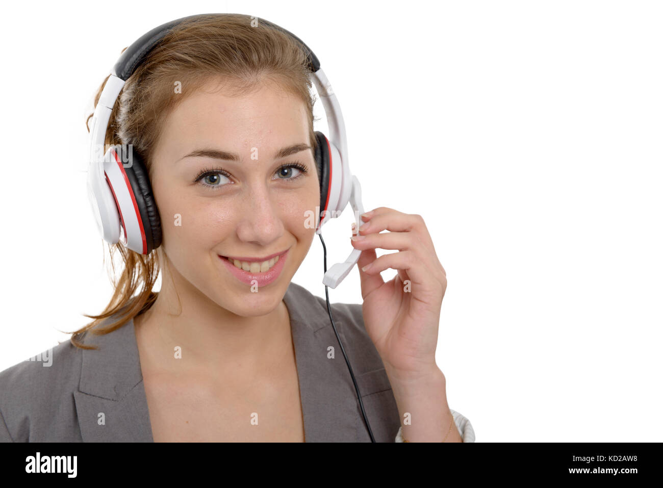 a beautiful smiling young woman with a headset, on white background ...