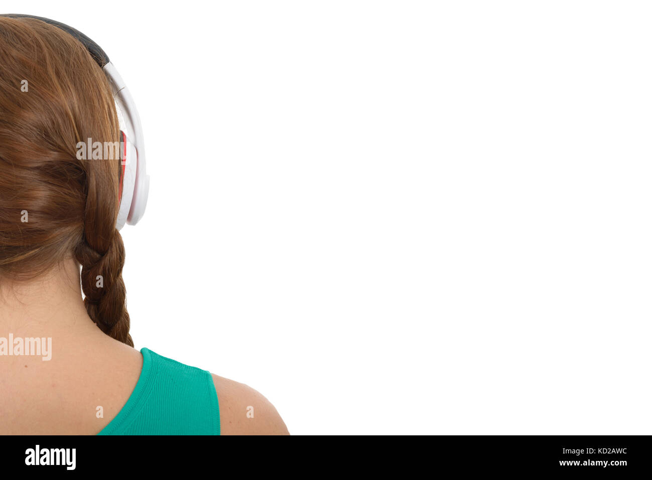 young woman listenning music with headphone, back view, isolated on ...
