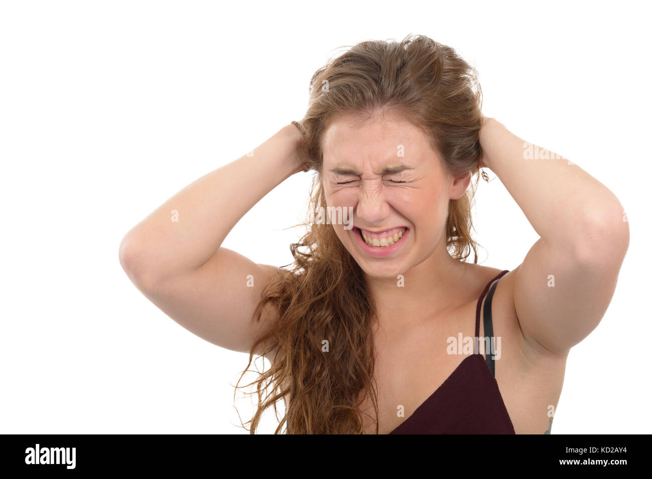 Frustrated woman pulling her hair isolated on white background Stock ...