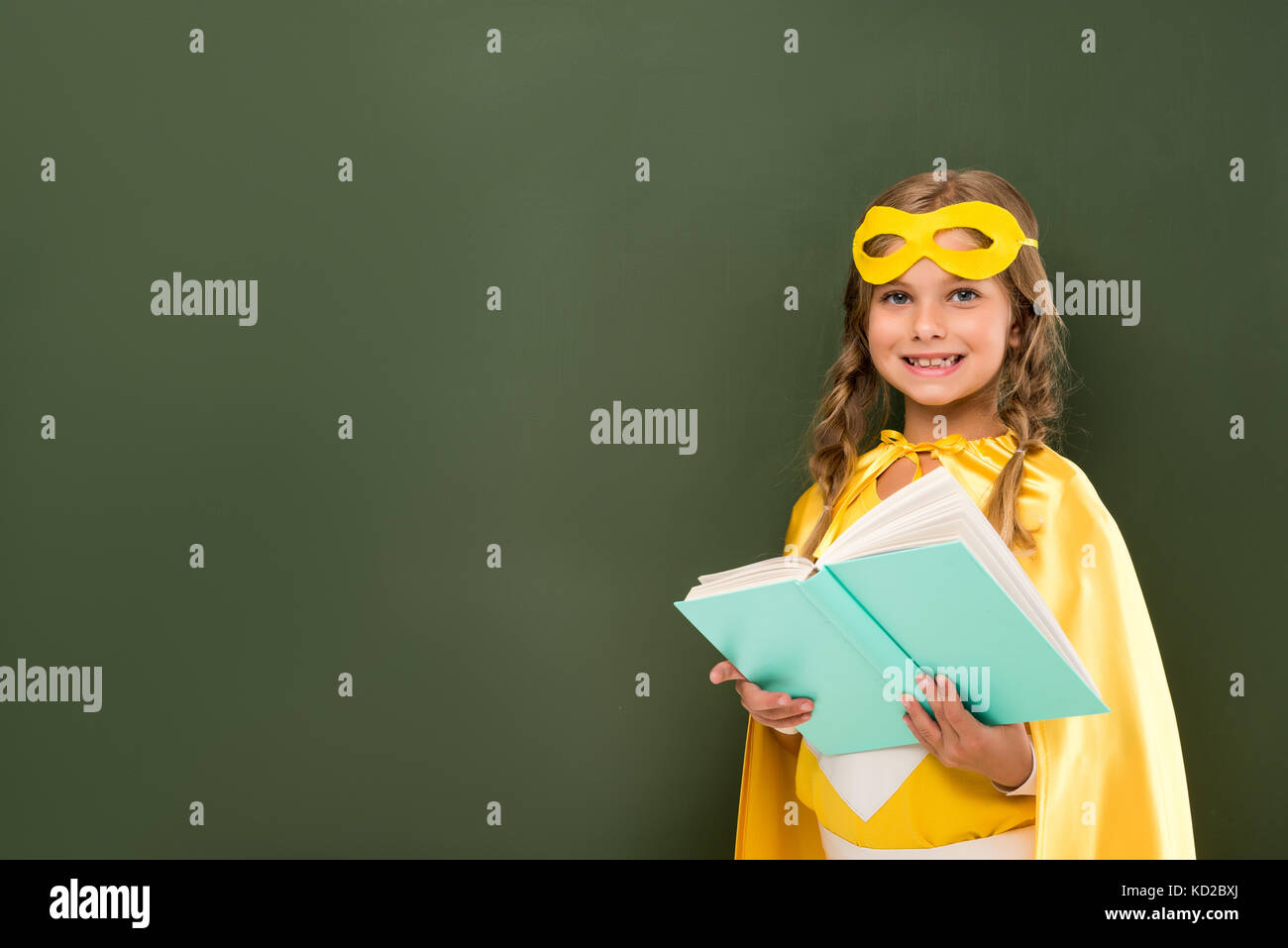 Superhero reading hi-res stock photography and images - Alamy