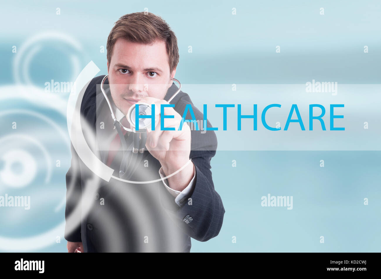 Successful male doctor with stethoscope at his job doing consultation ...