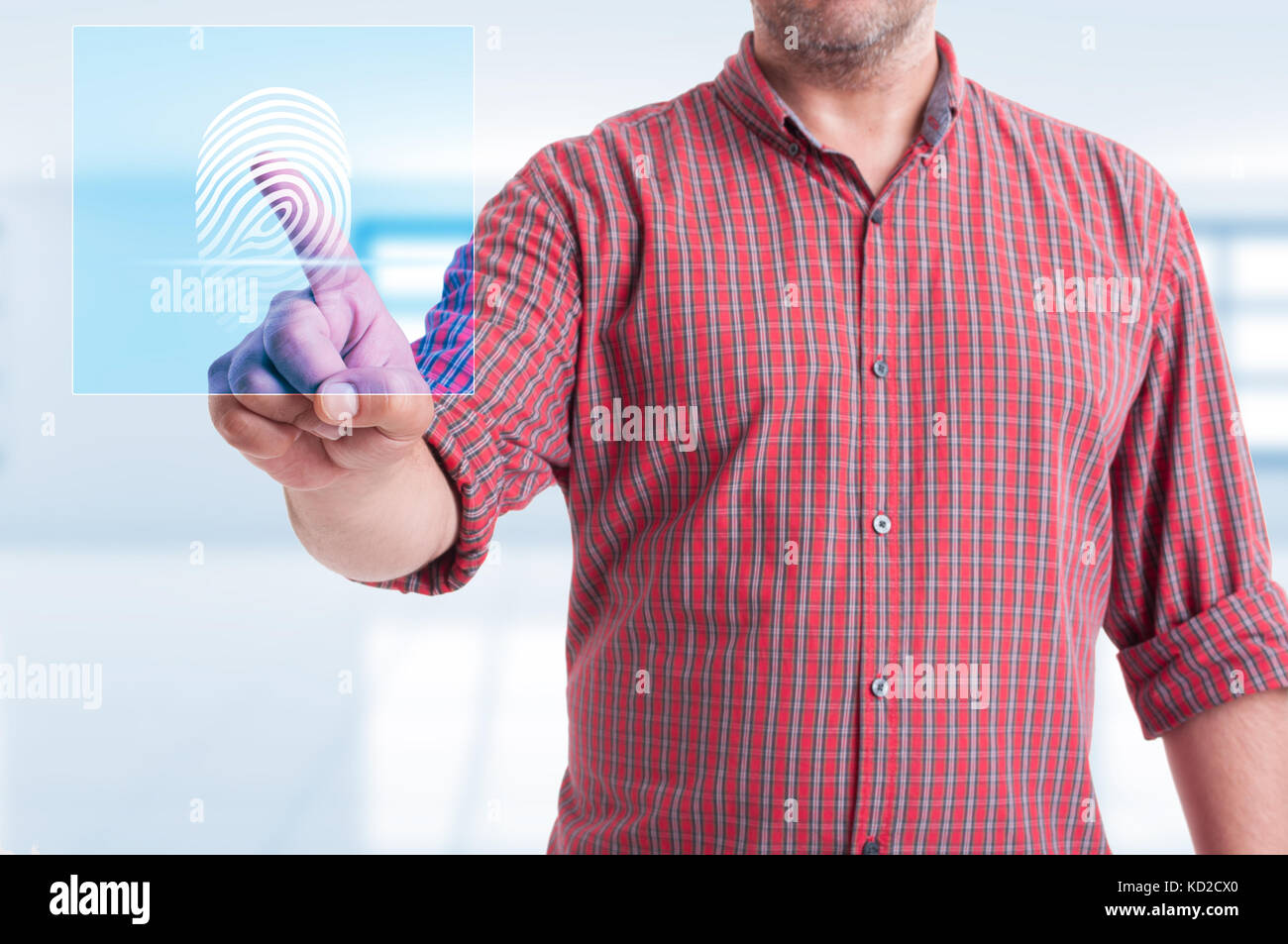 Male touching modern button for fingerprint scan to provide security ...