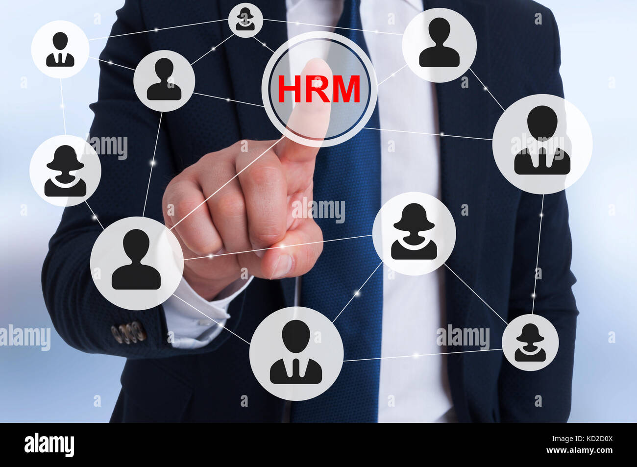 Manager pointing on HRM sign on virtual screen with people icons linked ...
