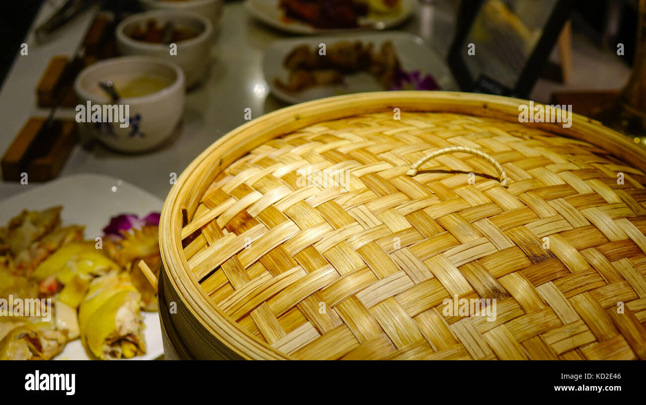 Chinese cuisine - dim sum in bamboo case at buffet restaurant Stock ...