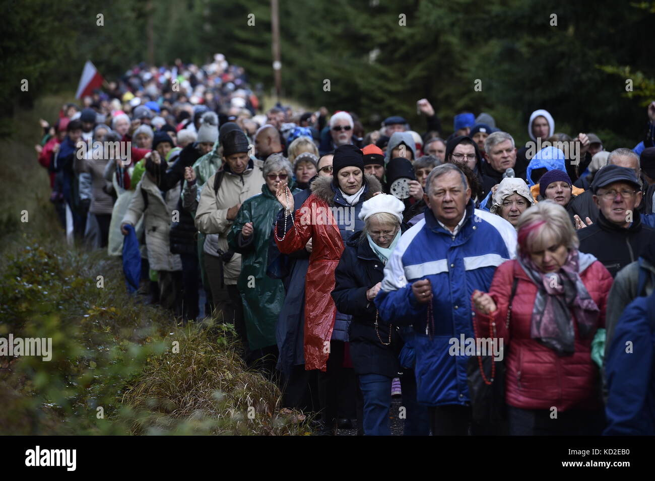 Hundreds of Polish pilgrims pray during the procession at the Polish ...