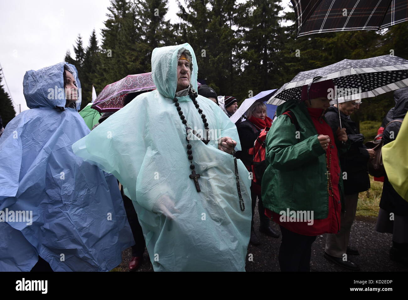 Hundreds of Polish pilgrims pray during the procession at the Polish ...