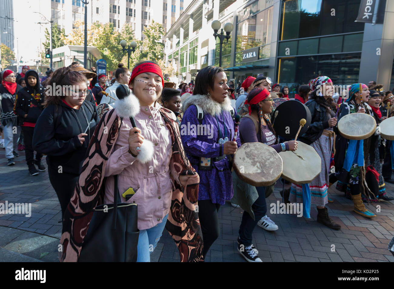 Seattle, United States. 09th Oct, 2017. Tribe members and supporters ...