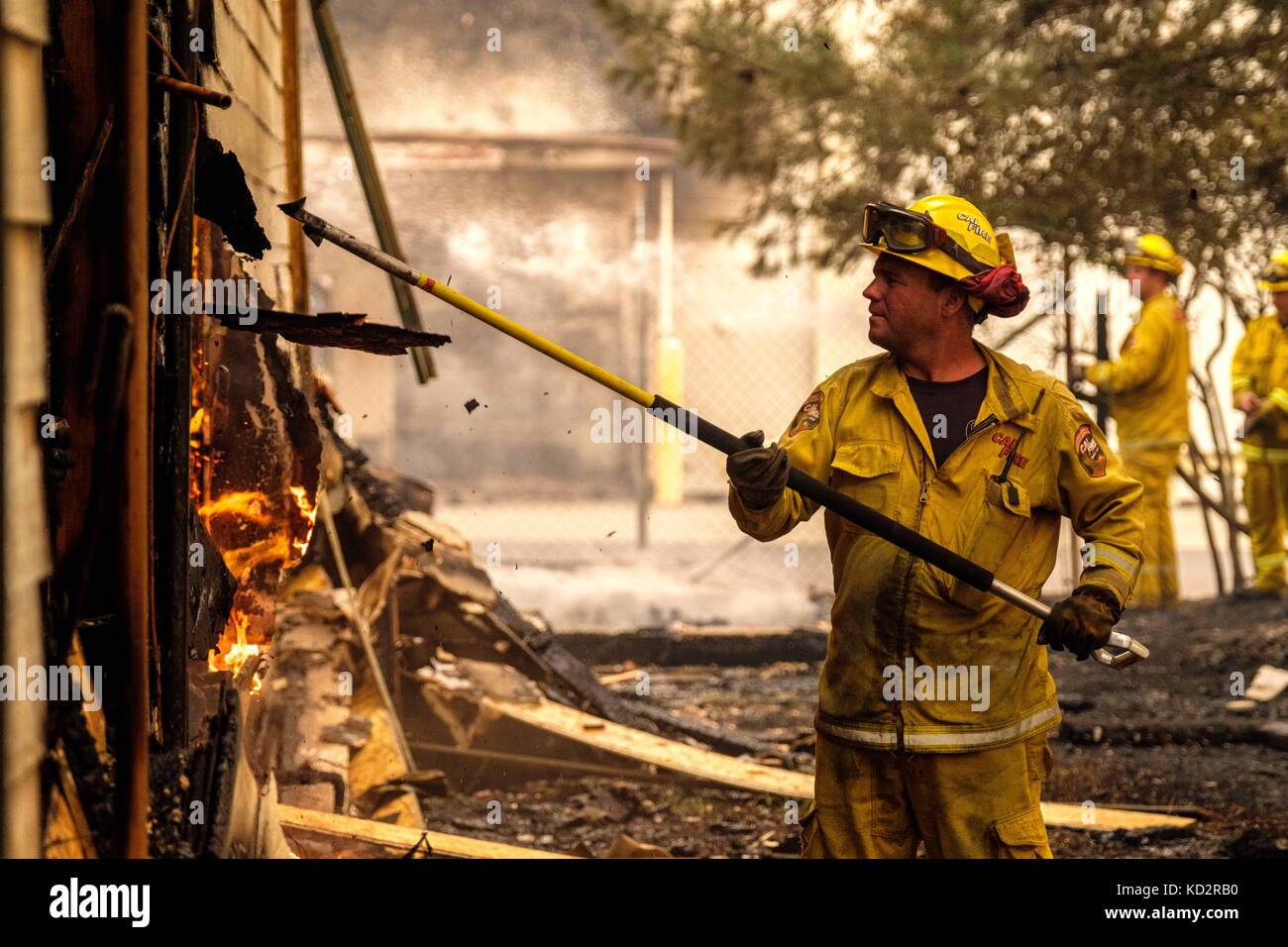 Santa Rosa, California, USA. 9th Oct, 2017. Firefighters work a fast ...