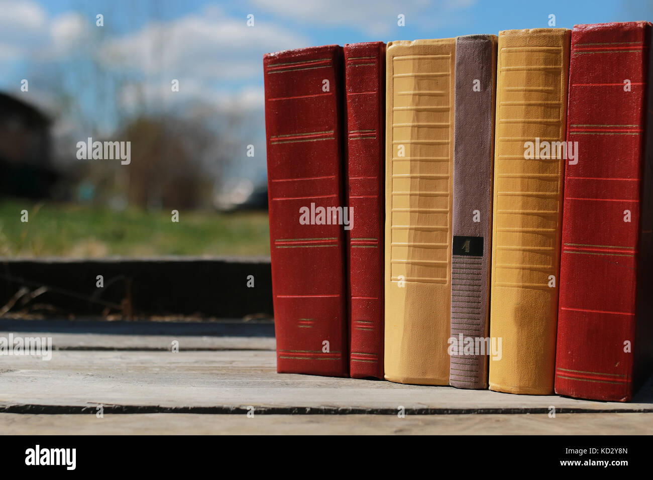books standing on a table Stock Photo - Alamy